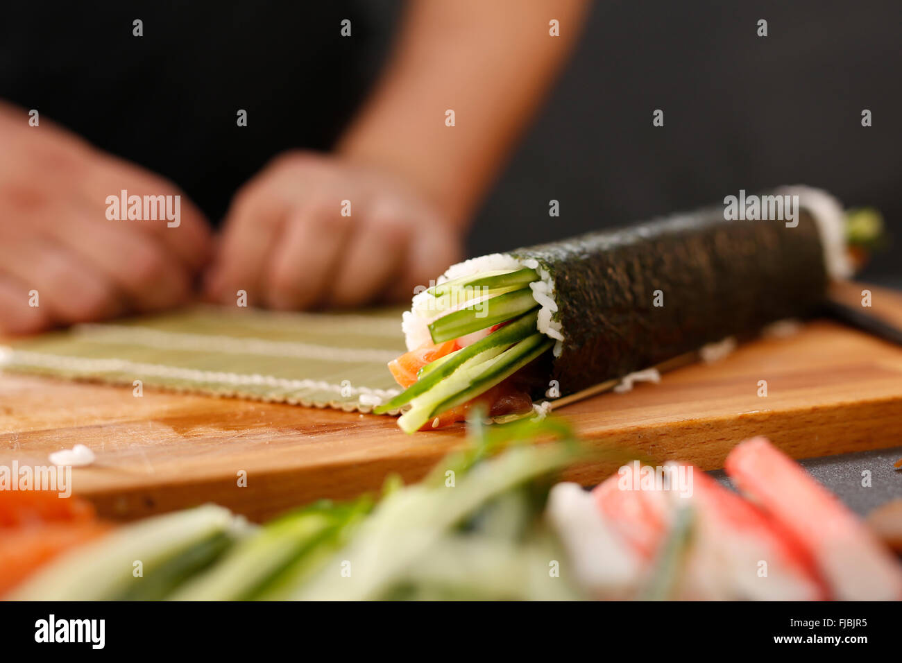 The steps for creating sushi. Folding sushi. Preparing sushi. Bamboo ...