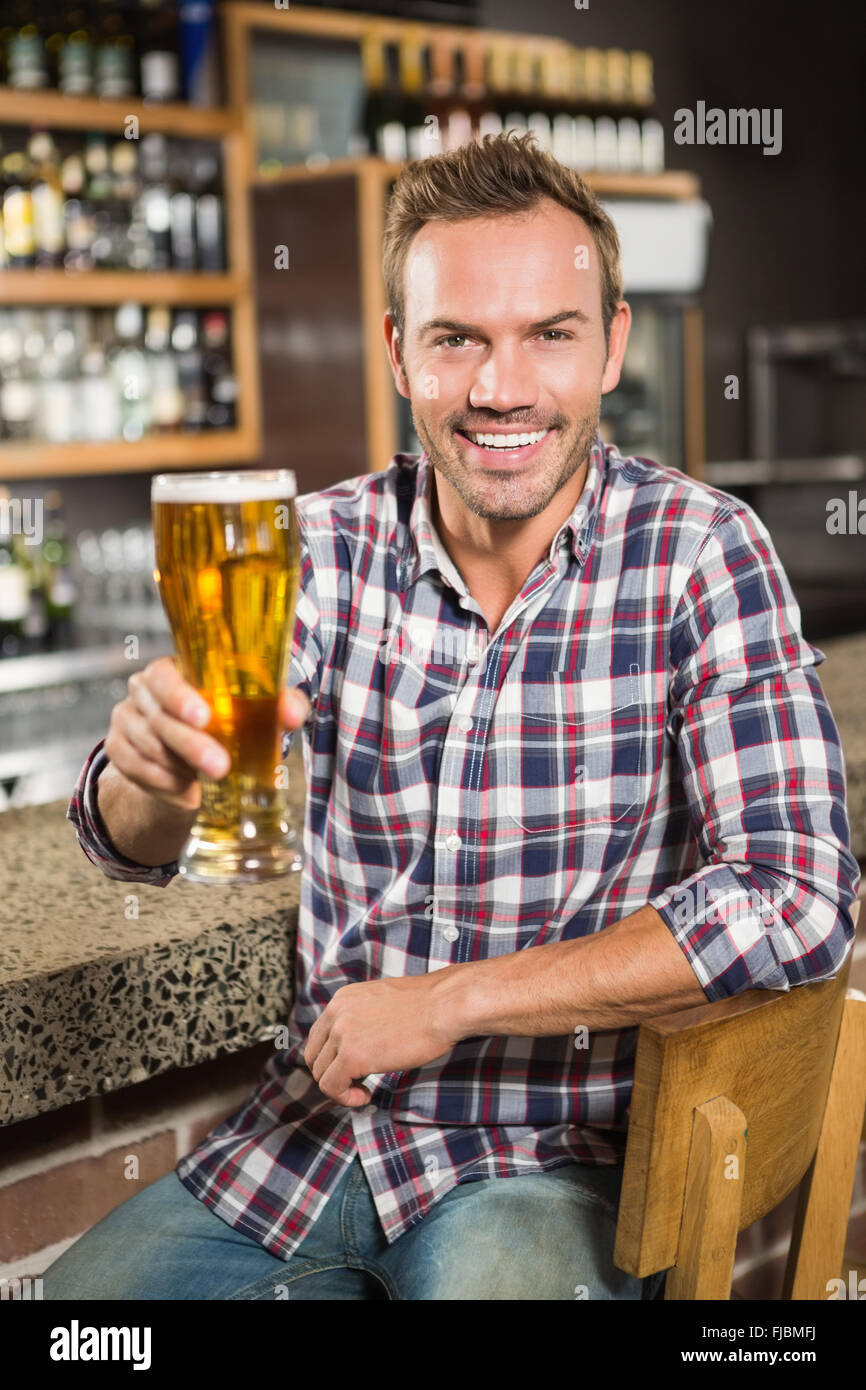 Handsome man having a beer Stock Photo - Alamy
