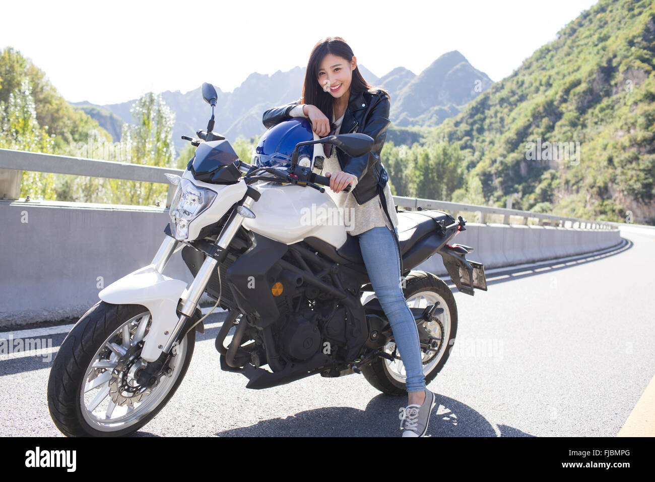 Woman riding a motorcycle hi-res stock photography and images - Alamy