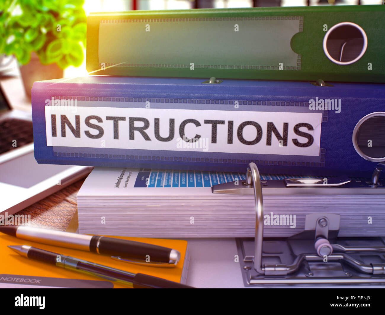 Instructions on Blue Office Folder. Toned Image Stock Photo - Alamy