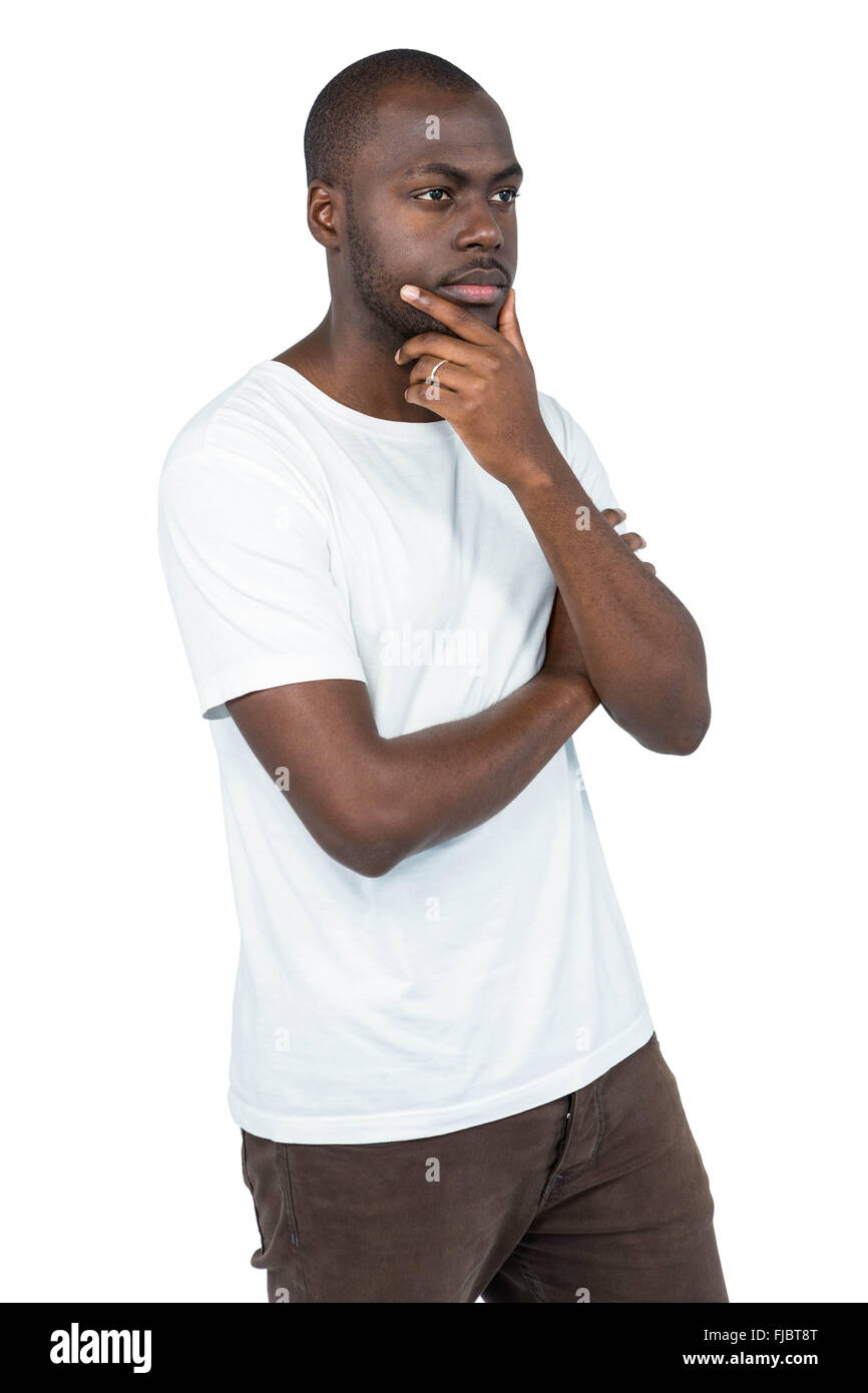 Thoughtful man with hand on chin Stock Photo - Alamy