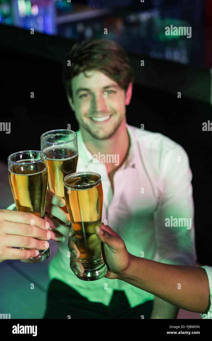 Happy man toasting his glass of beer Stock Photo - Alamy