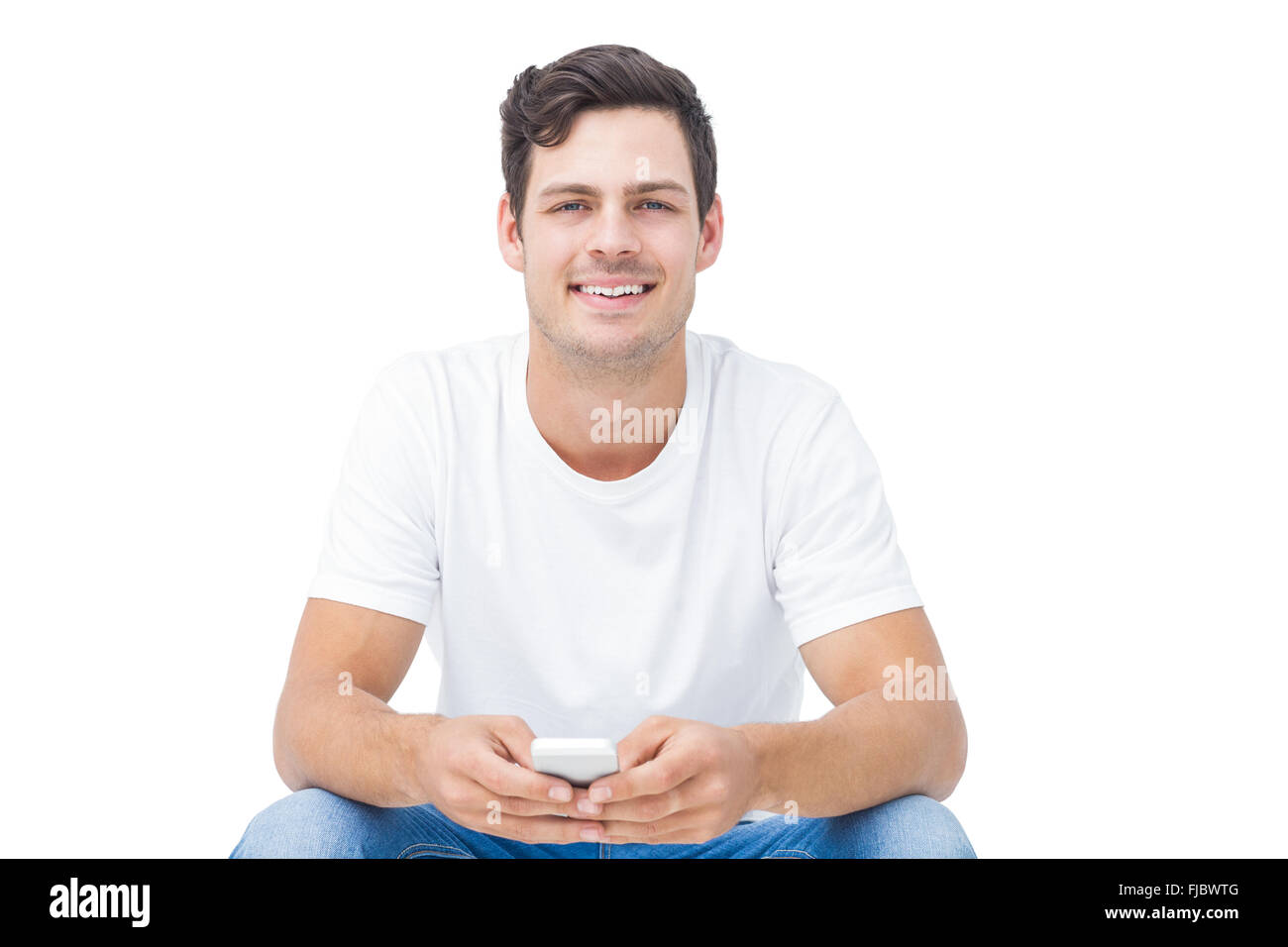 Handsome man texting Stock Photo - Alamy