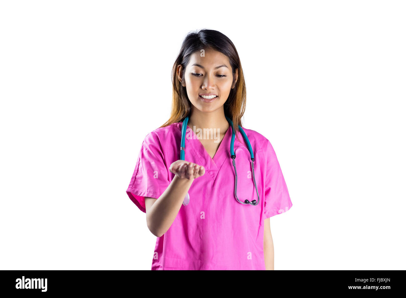 Asian nurse stretching out hand Stock Photo - Alamy