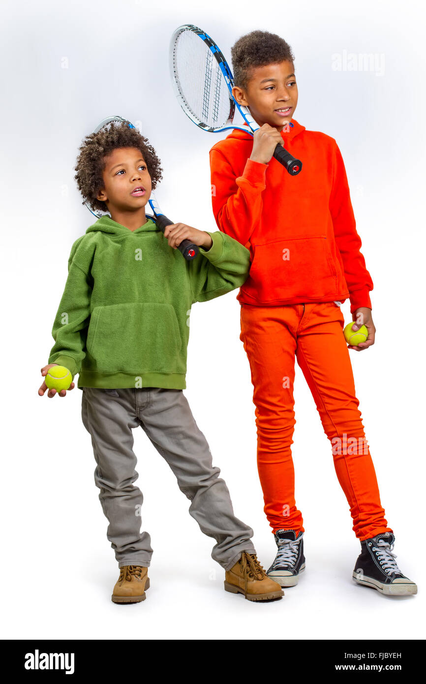 Boys with tennis rackets Stock Photo - Alamy