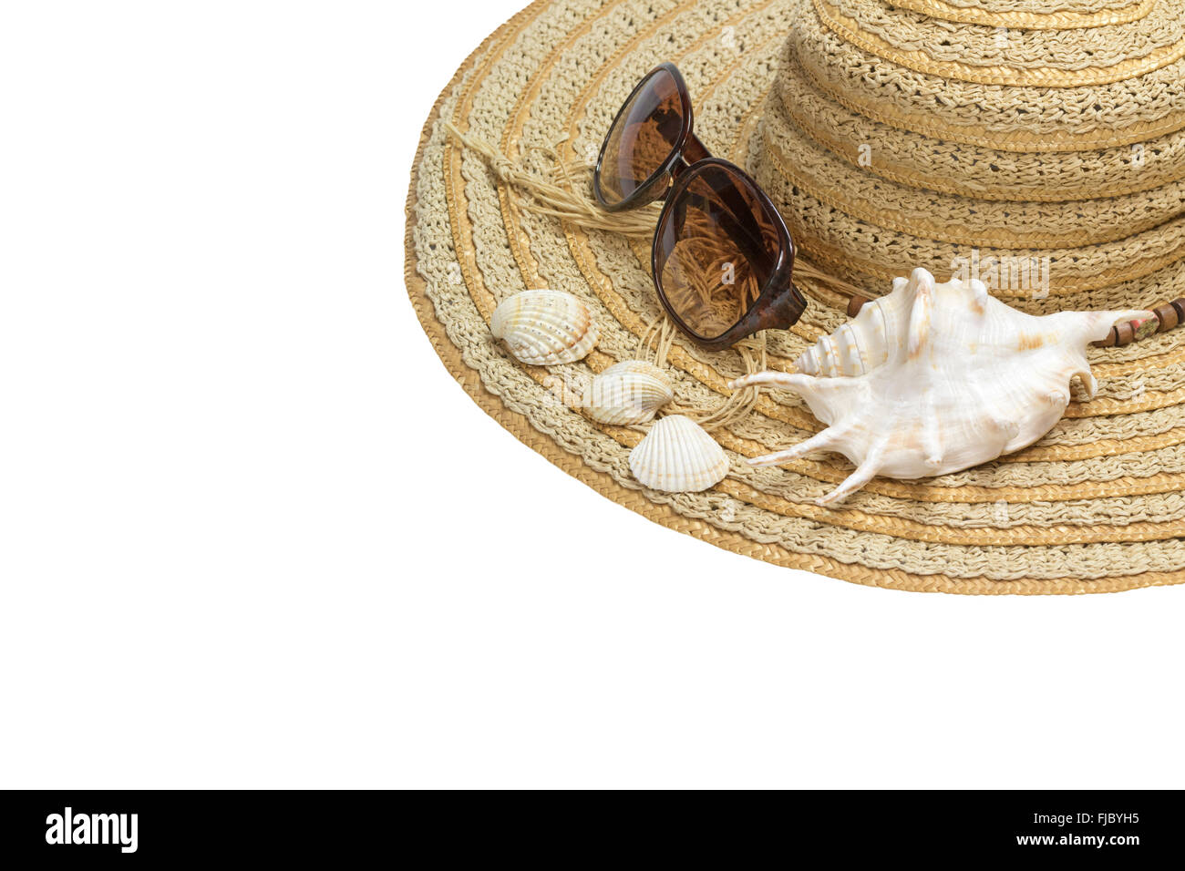 Straw hat, sunglasses and seashell isolated on the white background ...