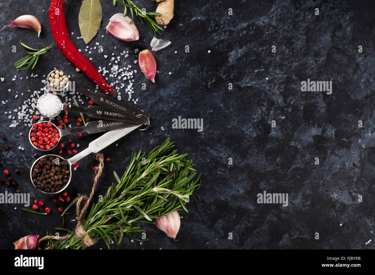 Herbs spices top view with copy space over stone table hi-res stock photography and images - Alamy