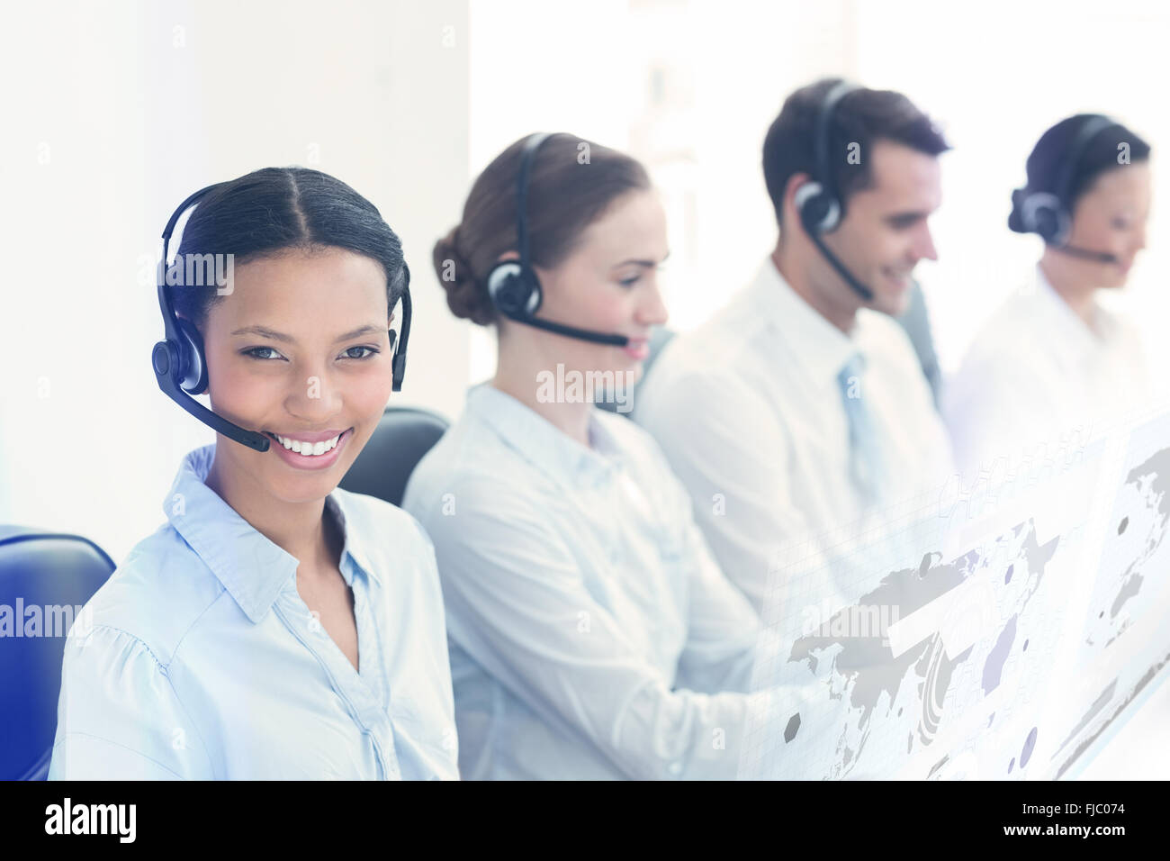Composite image of business people with headsets using computers Stock ...