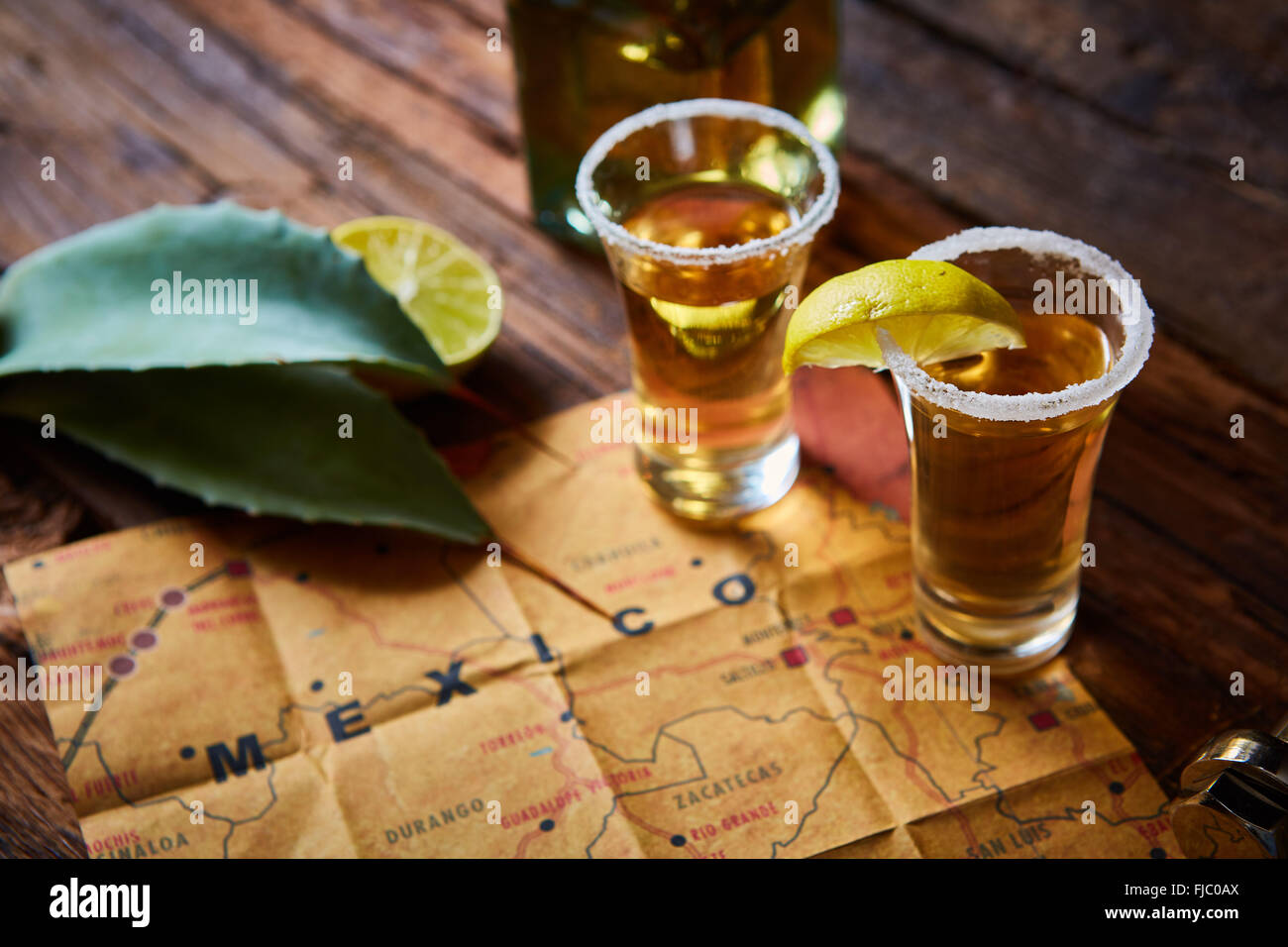 Tequila shot with lime and sea salt Stock Photo - Alamy