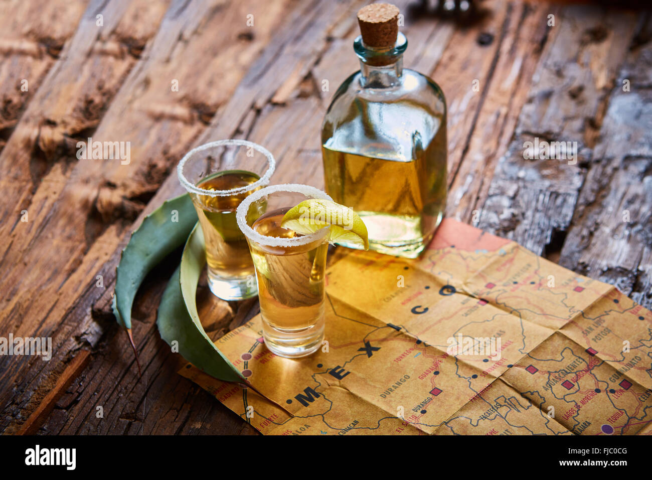 Tequila shot with lime and sea salt Stock Photo - Alamy