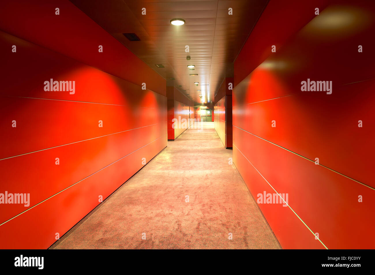Modern building red corridor with metallic walls. Horizontal Stock ...