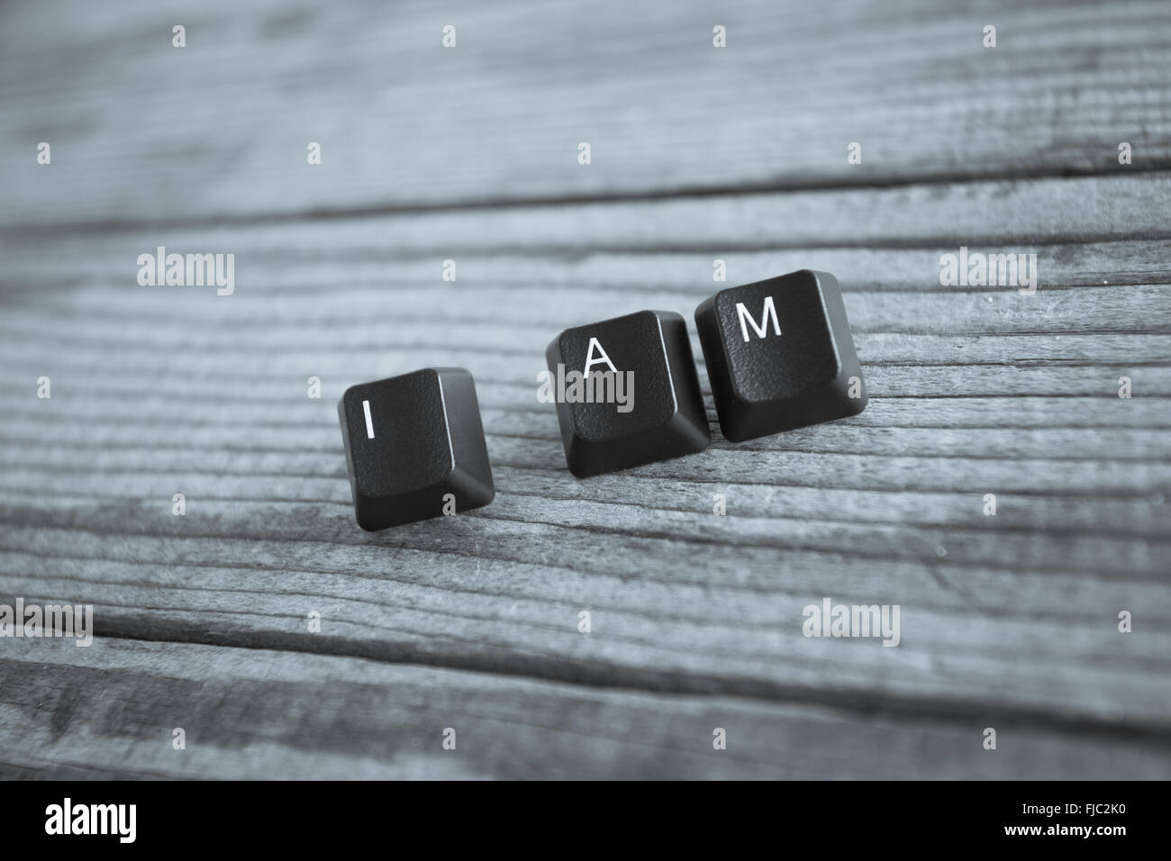 I AM wrote with keyboard keys on wooden background Stock Photo - Alamy