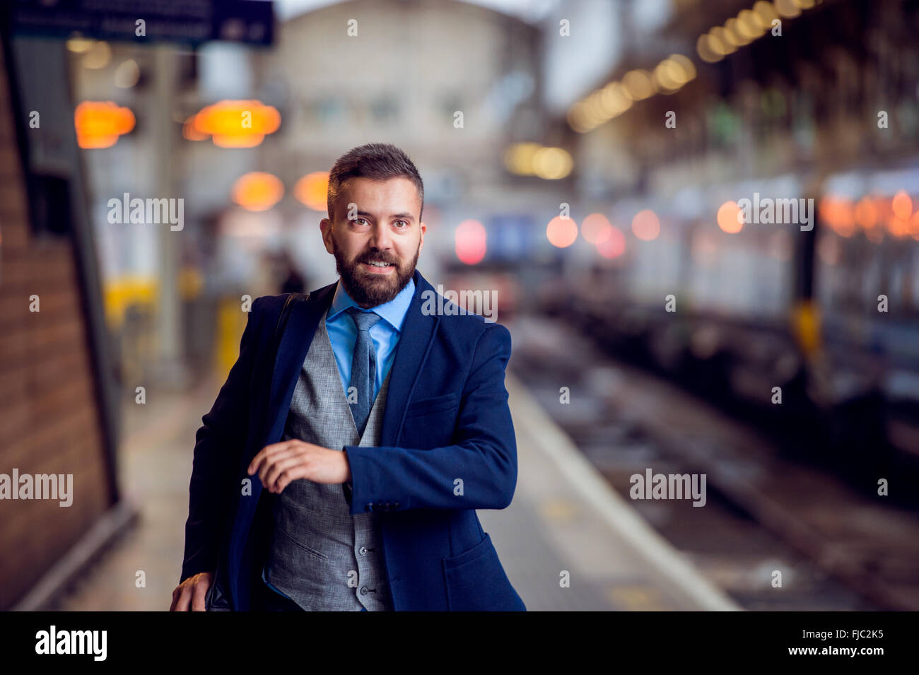 Man running train station hi-res stock photography and images - Alamy