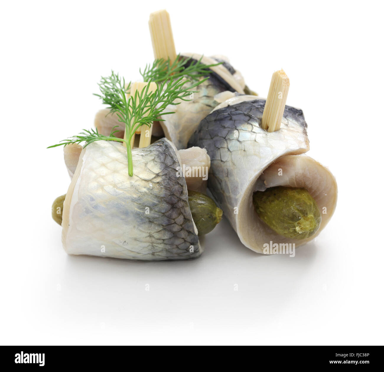 homemade rollmops, rolled pickled herring fillets Stock Photo: 97381670 ...