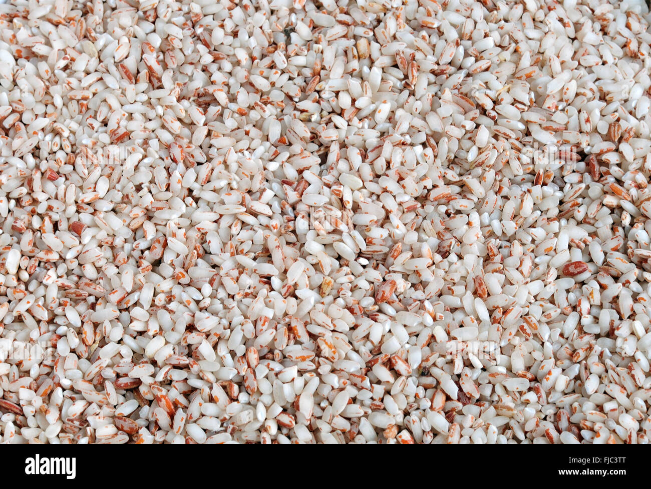 Brown rice background Stock Photo - Alamy