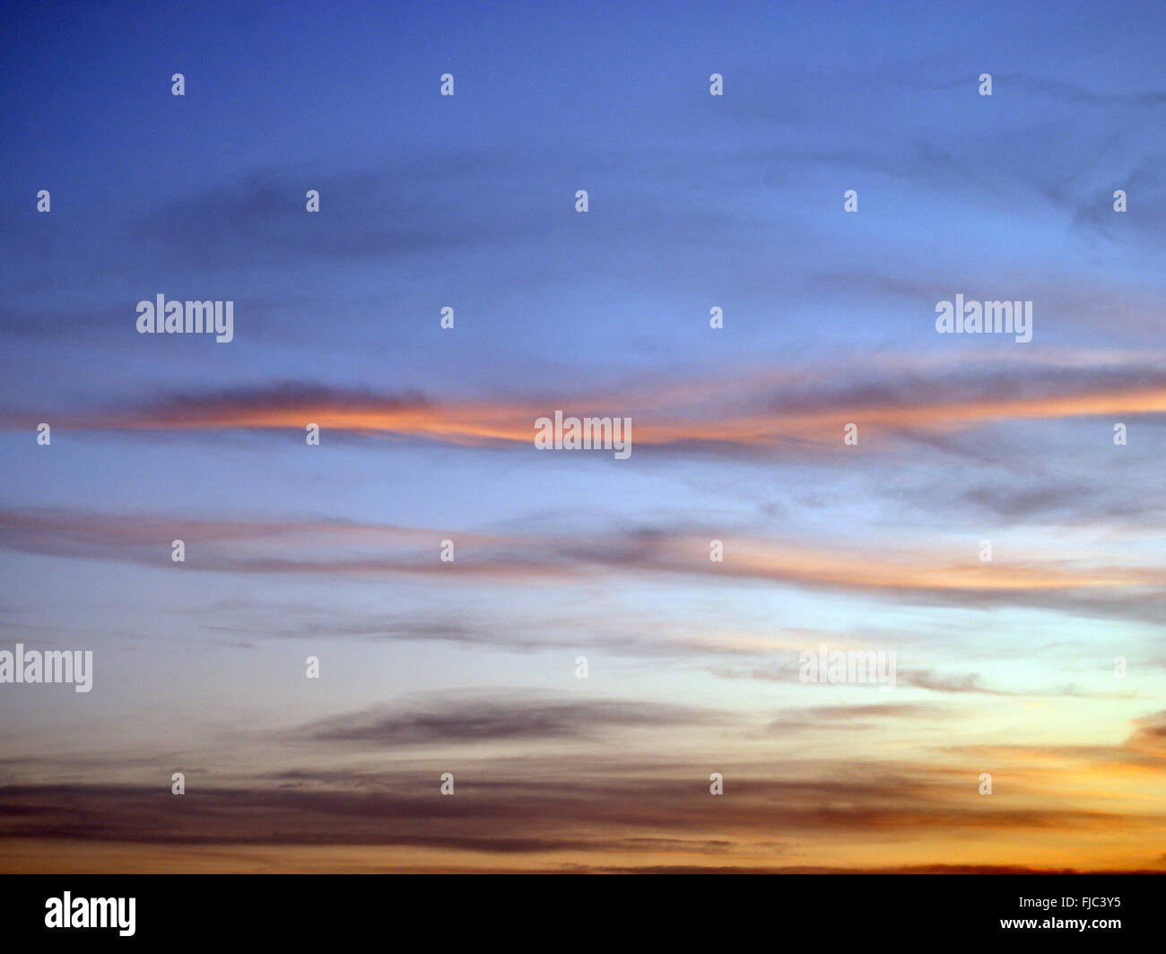 Clouds in sunset sky Stock Photo - Alamy