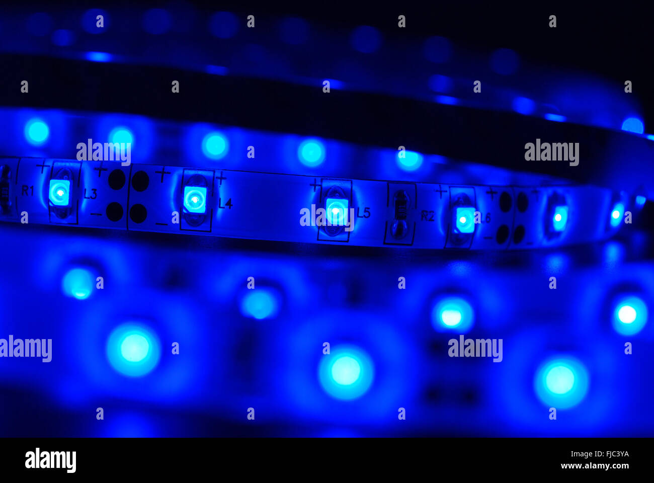 Blue led strip on the black background Stock Photo - Alamy