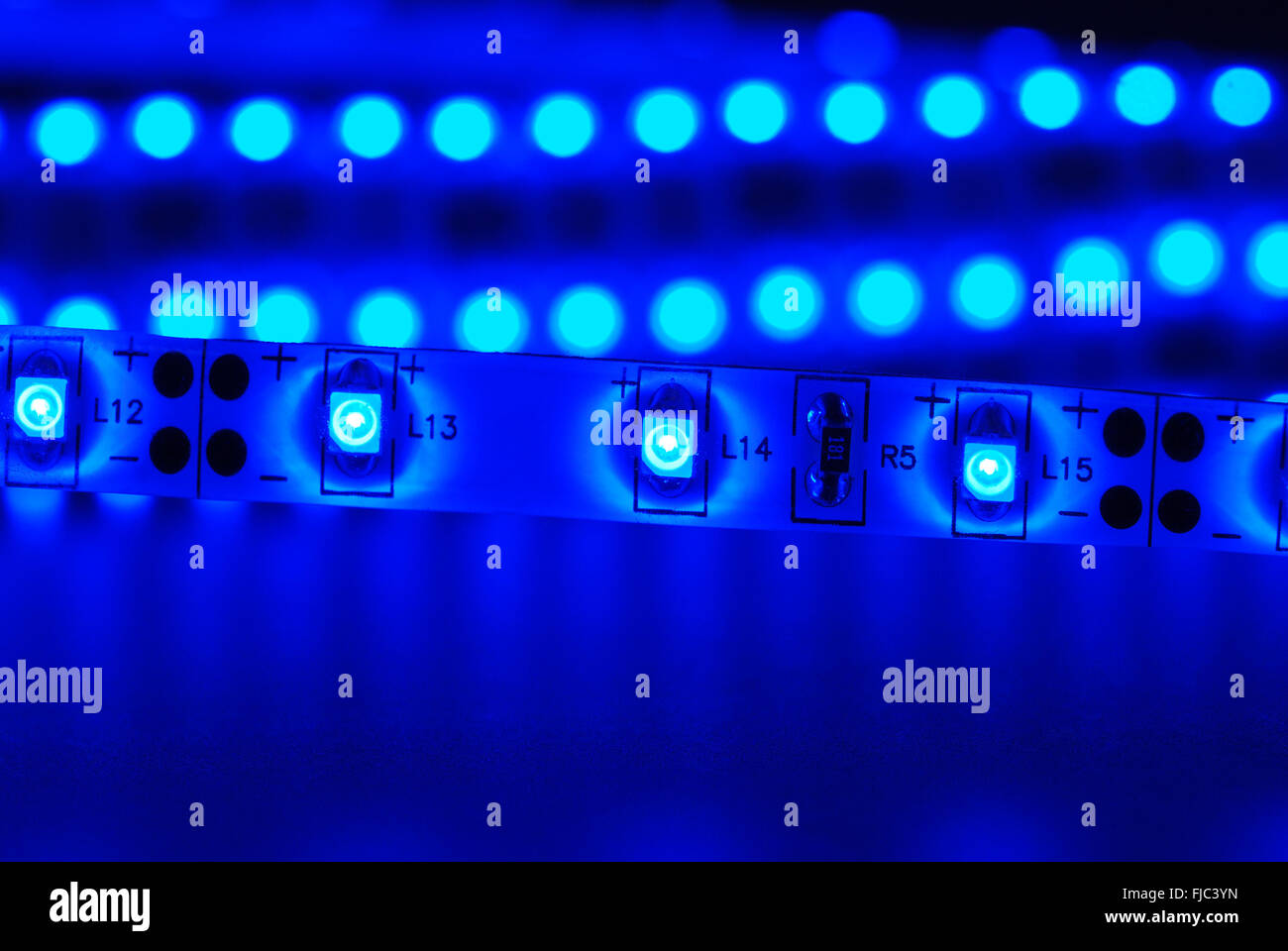 Blue led strip on the black background Stock Photo - Alamy