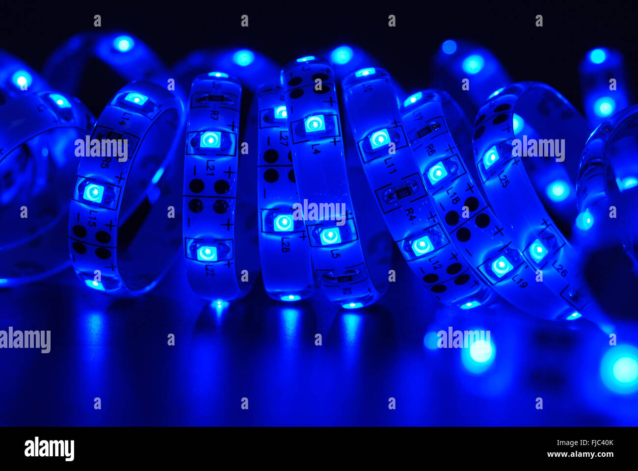 Blue led strip on the black background Stock Photo - Alamy