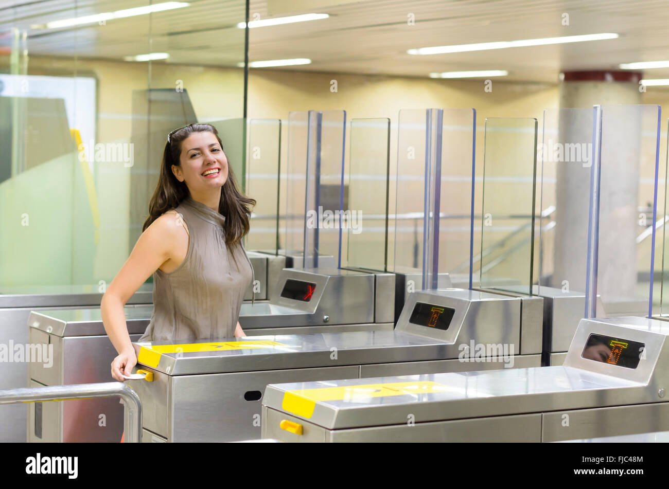 Woman using ticket tube hi-res stock photography and images - Alamy