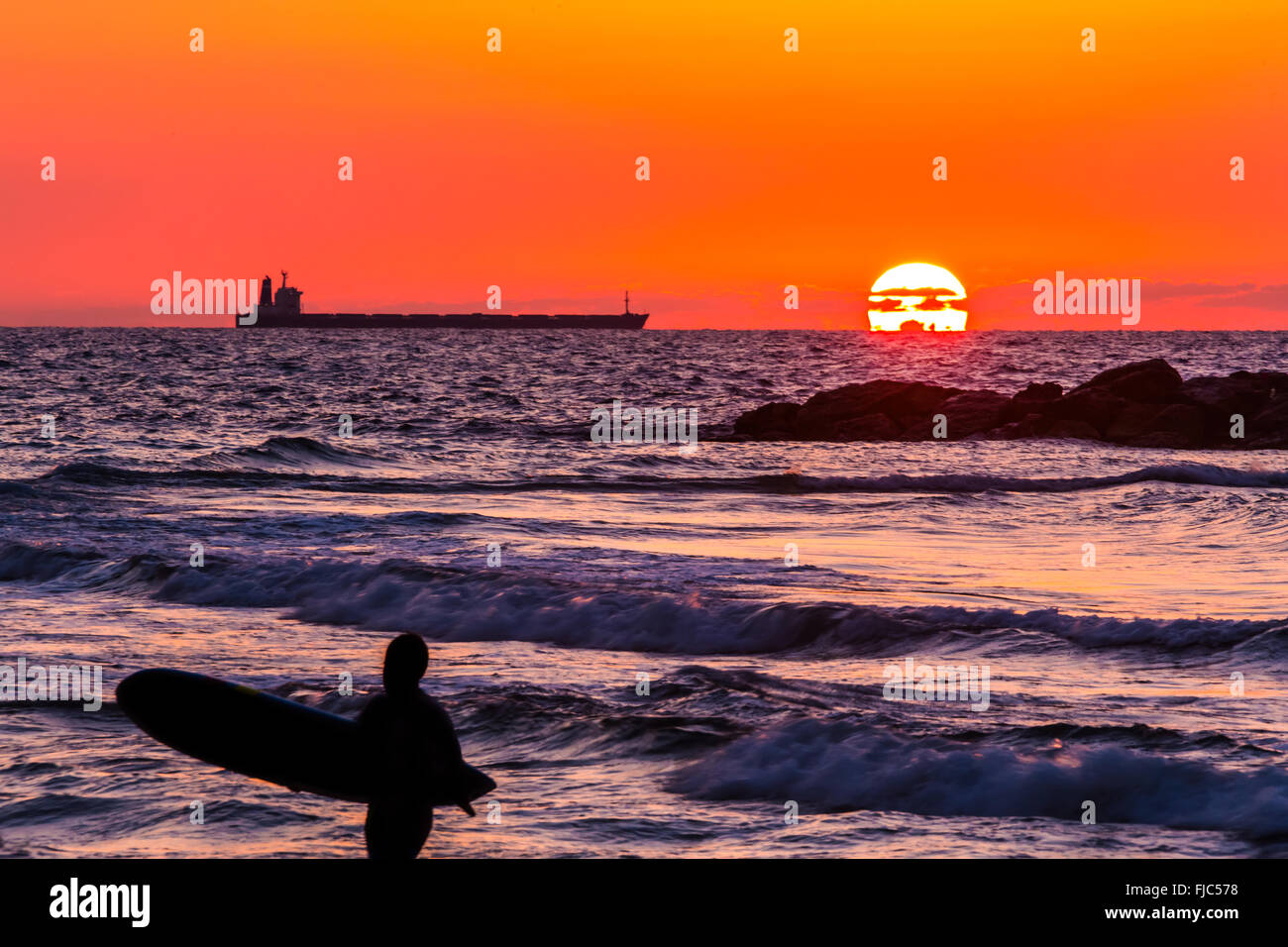 maritime landscape, large ship on sunset background Stock Photo - Alamy