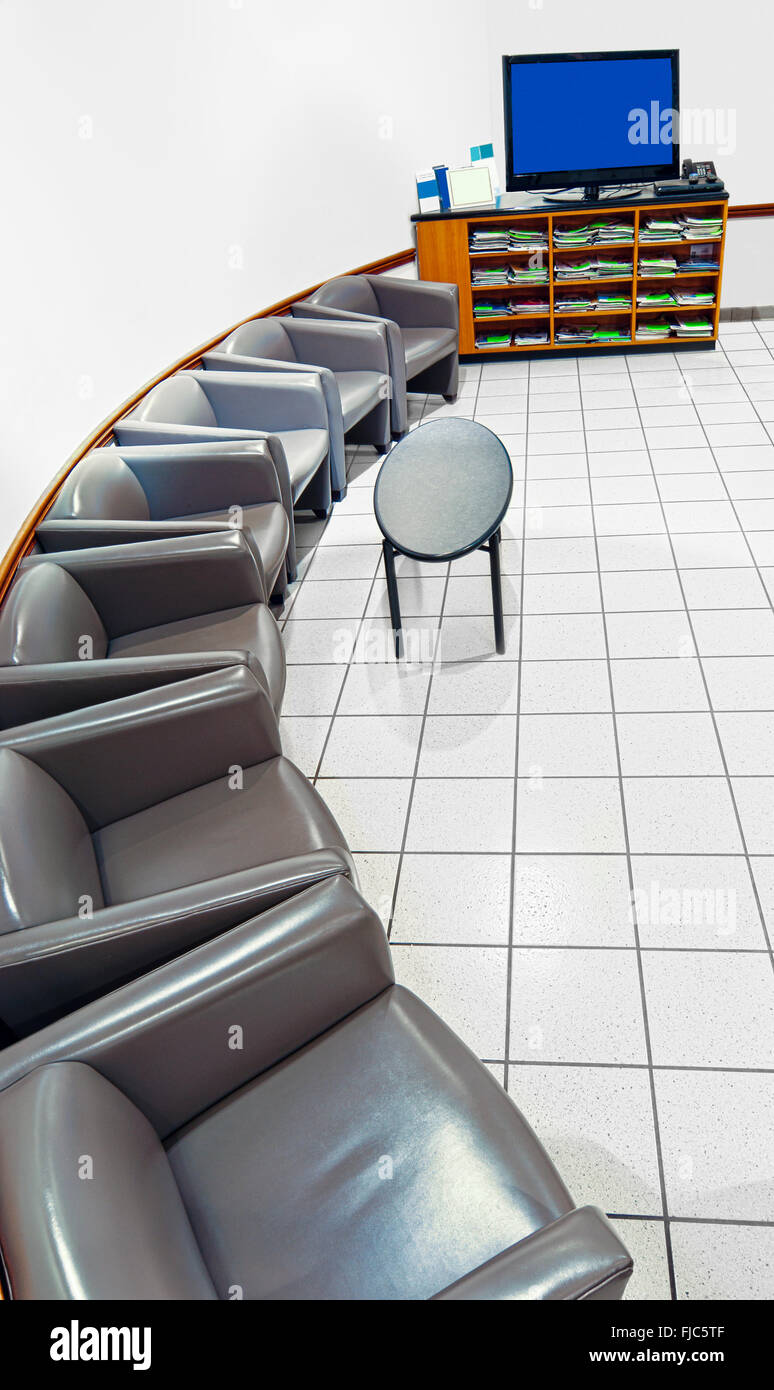 Empty Waiting Area With Blank TV Screen Stock Photo - Alamy