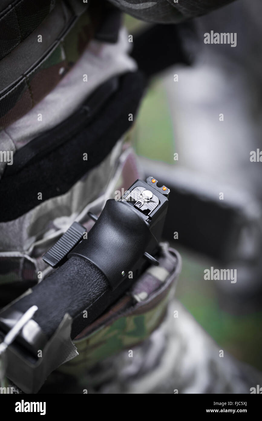 Military man gun on leg hi-res stock photography and images - Alamy