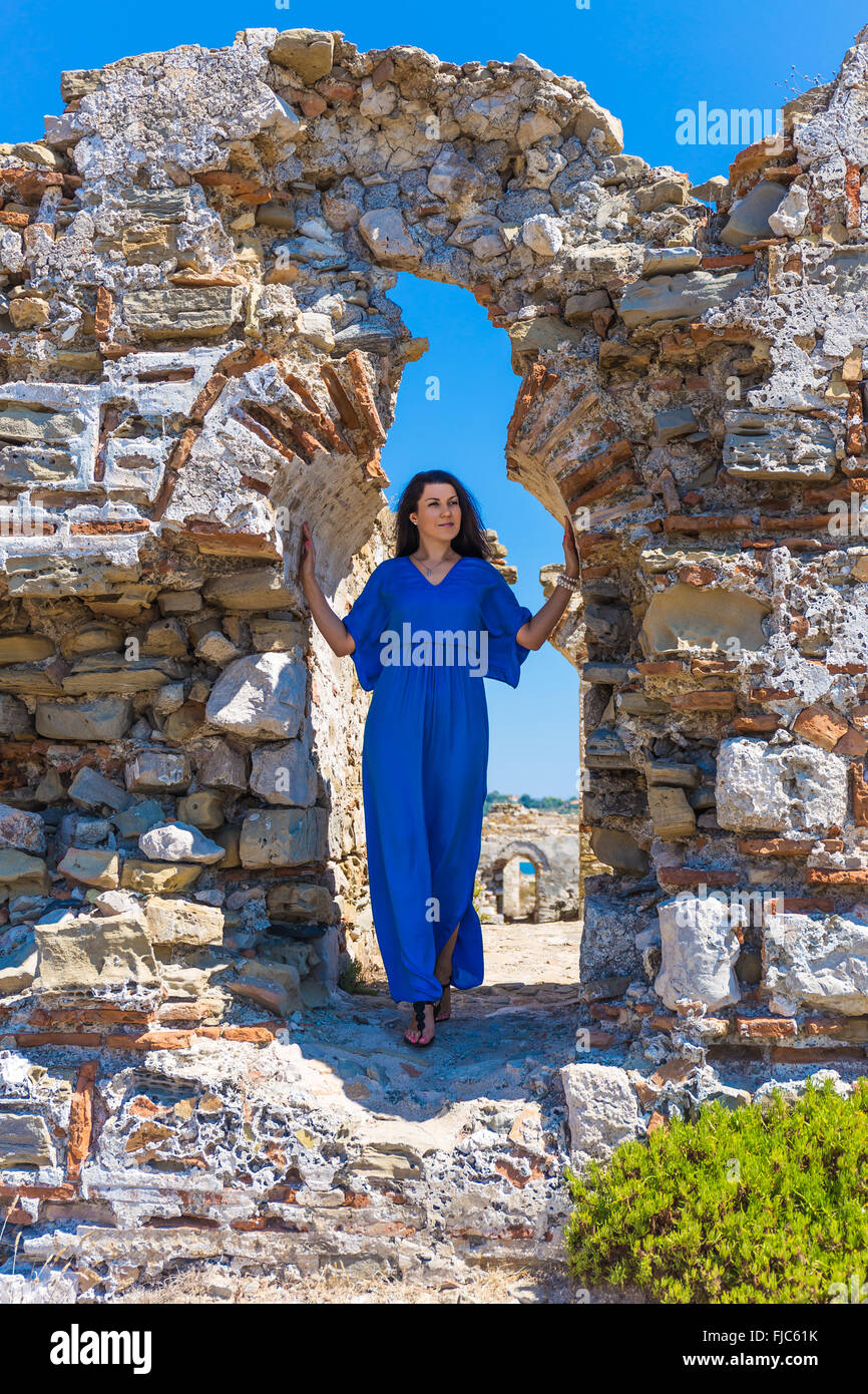 beautiful greek young brunet woman in blue dress Stock Photo - Alamy