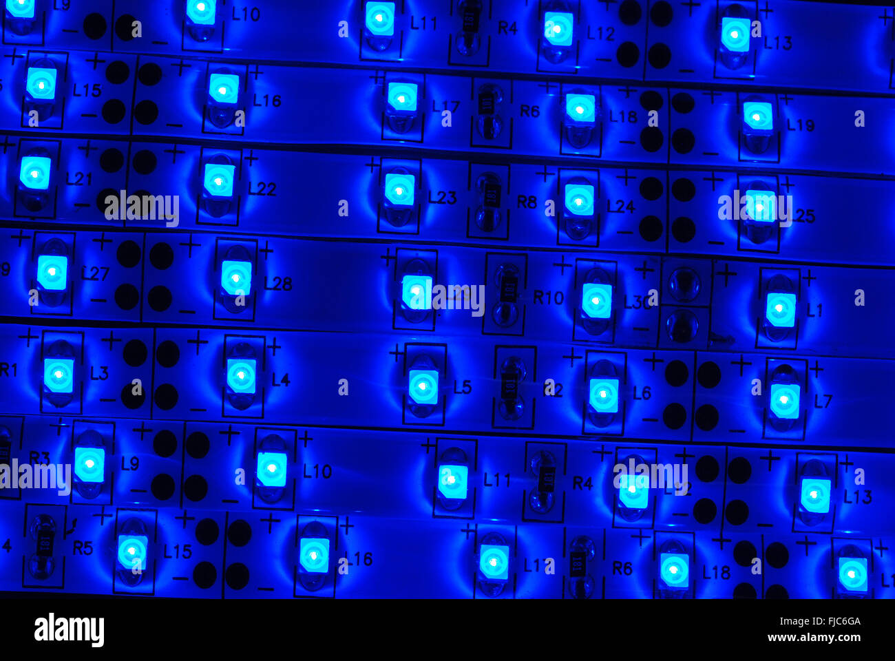 Blue led strip on the black background Stock Photo - Alamy