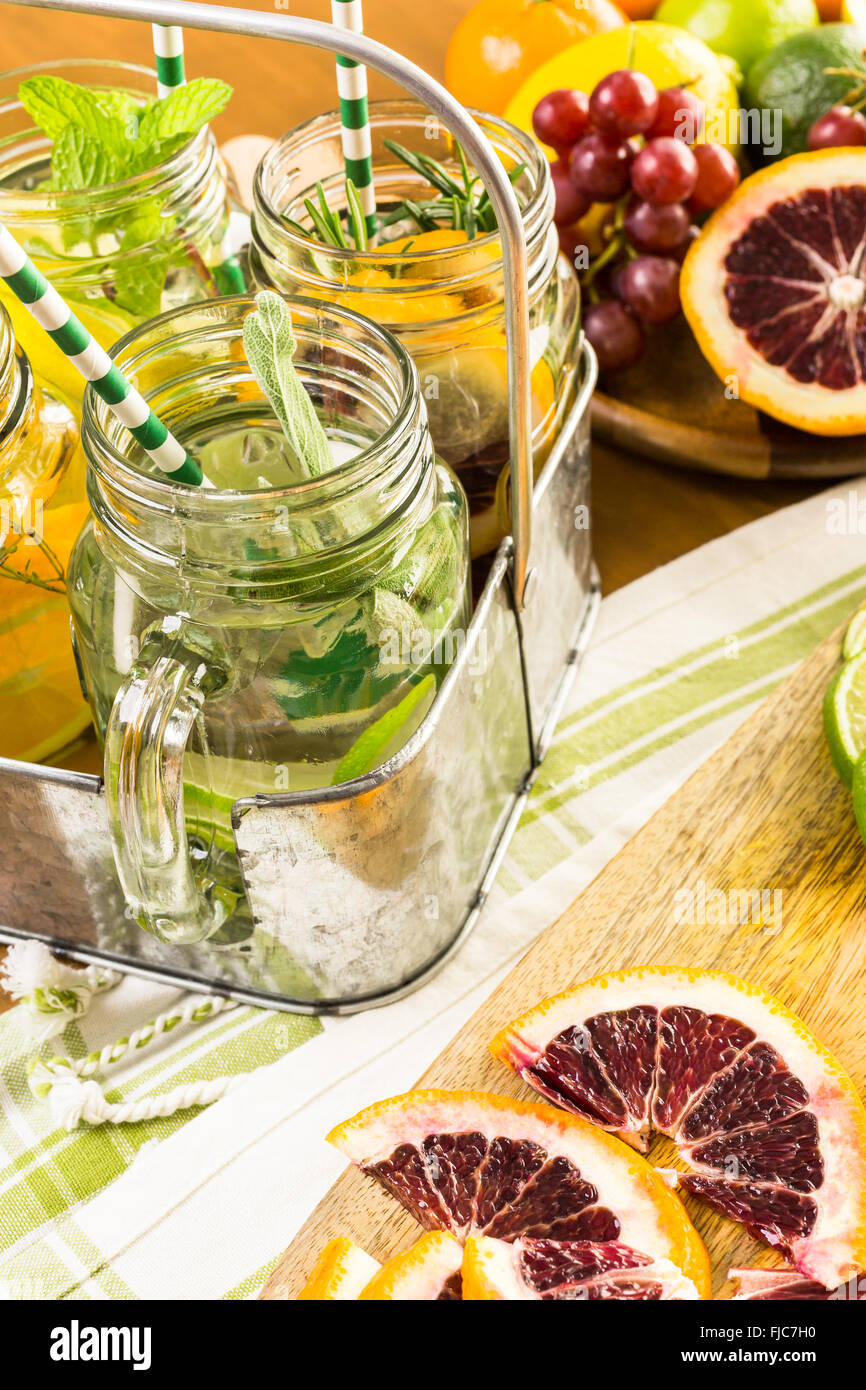 Detox citrus infused water as a refreshing summer drink Stock Photo - Alamy