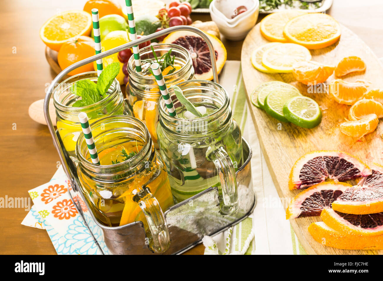 Detox citrus infused water as a refreshing summer drink Stock Photo - Alamy