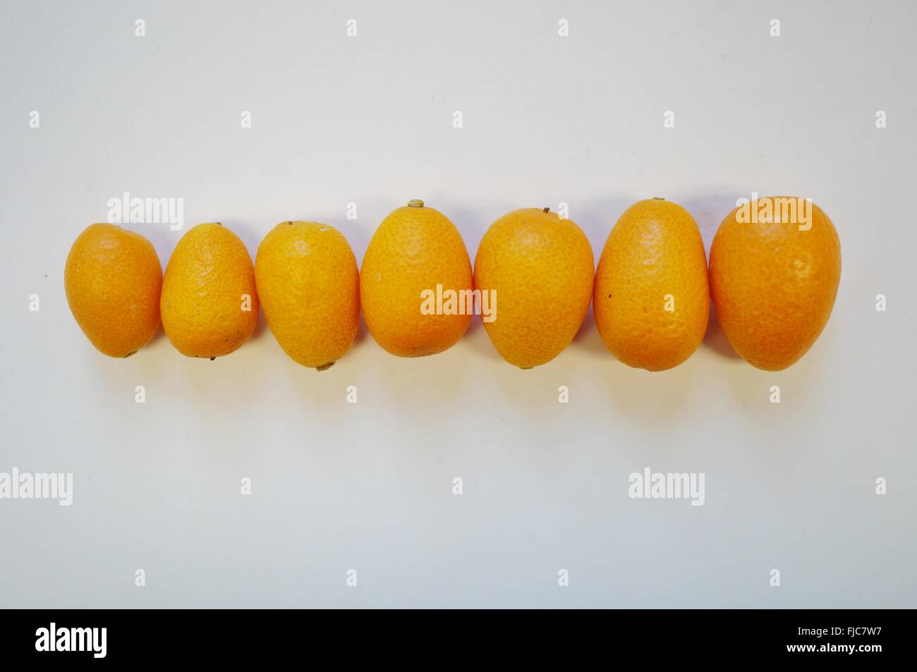 Tiny orange fruit hi-res stock photography and images - Alamy