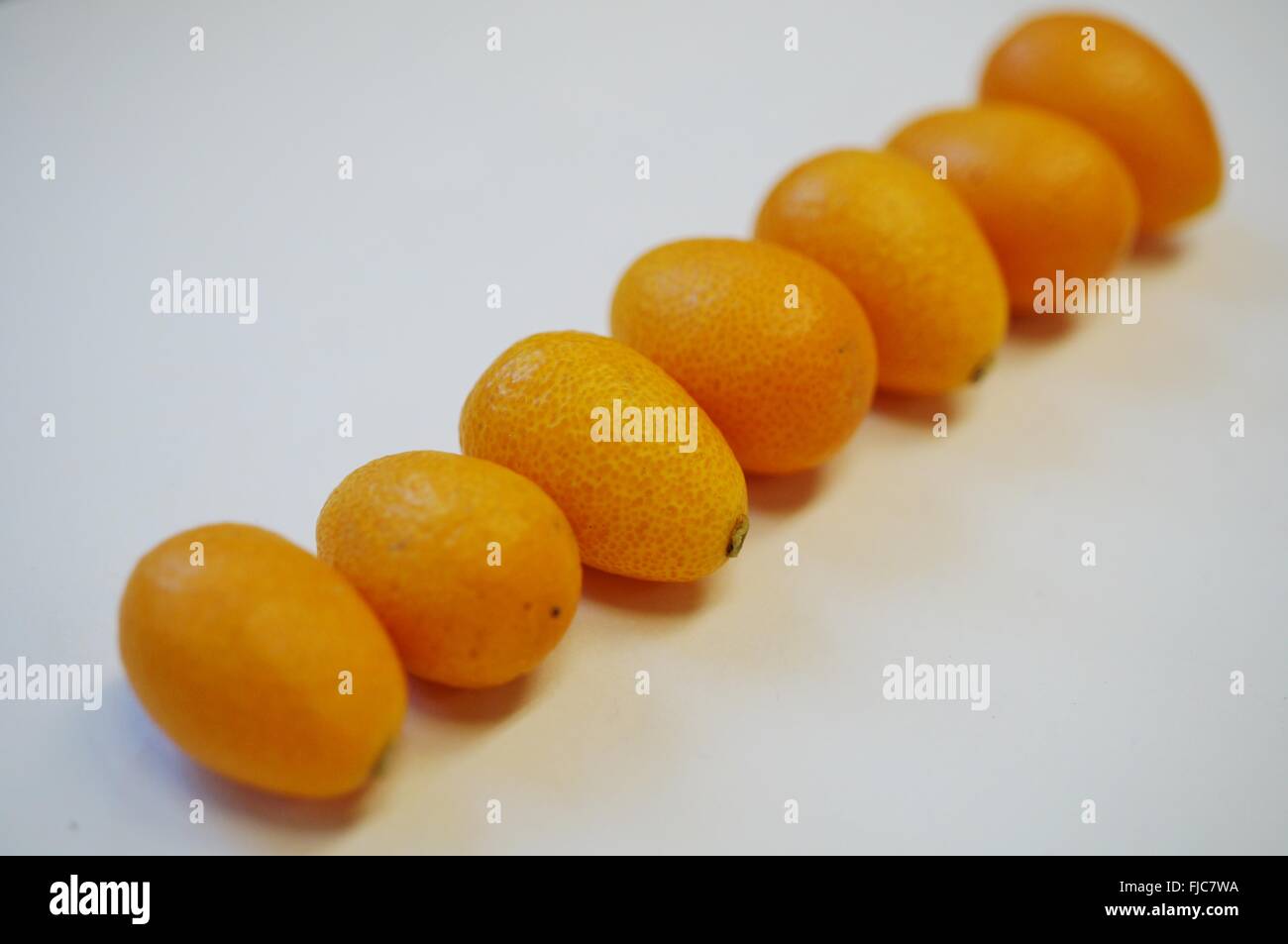 Ripe orange kumquat citrus fruit Stock Photo - Alamy