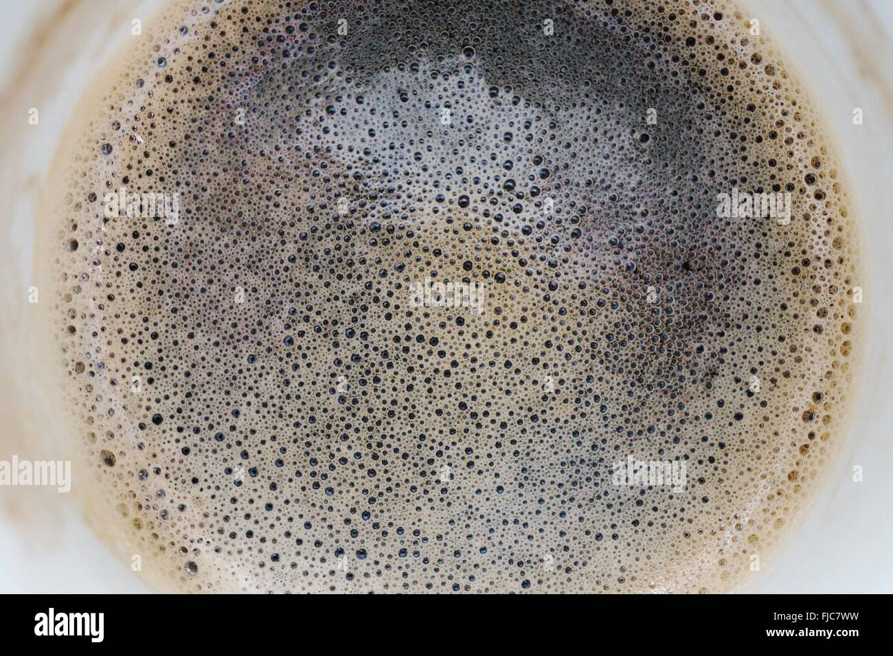 The texture at the top surface of a cup of strong coffee Stock Photo ...
