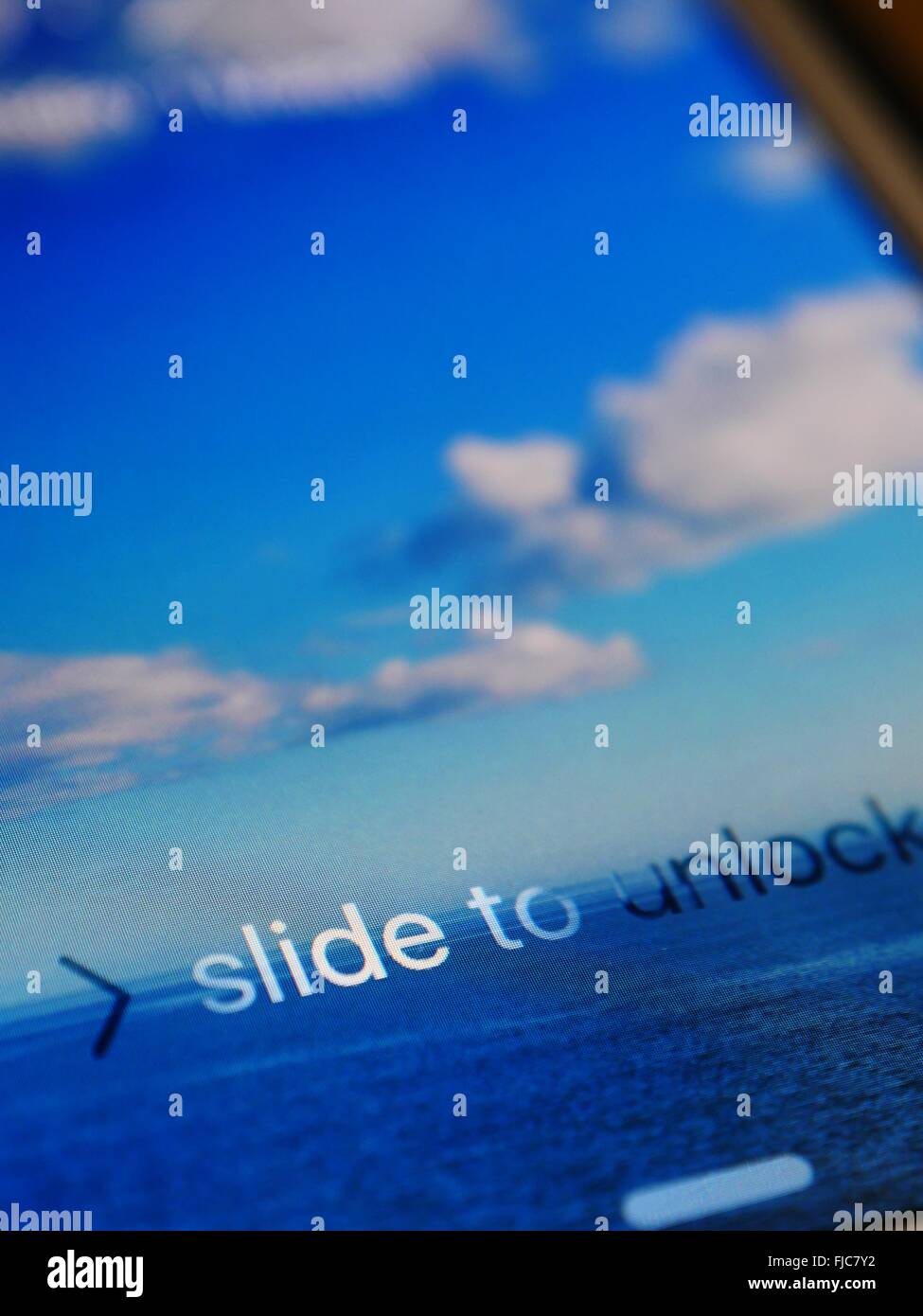 Apple iphone screen closeup slide to unlock Stock Photo - Alamy