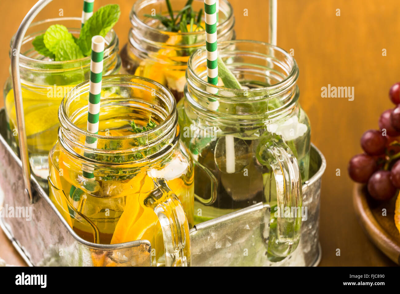 Detox citrus infused water as a refreshing summer drink Stock Photo - Alamy