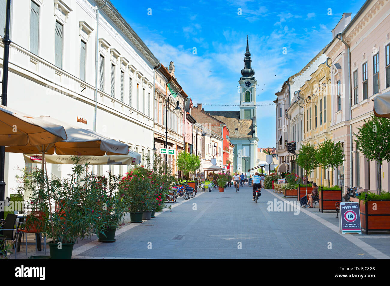 People on the street of Baja city center. Baja is a city in southern ...