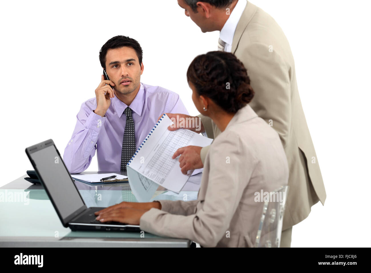 business team looking at the schedule Stock Photo - Alamy