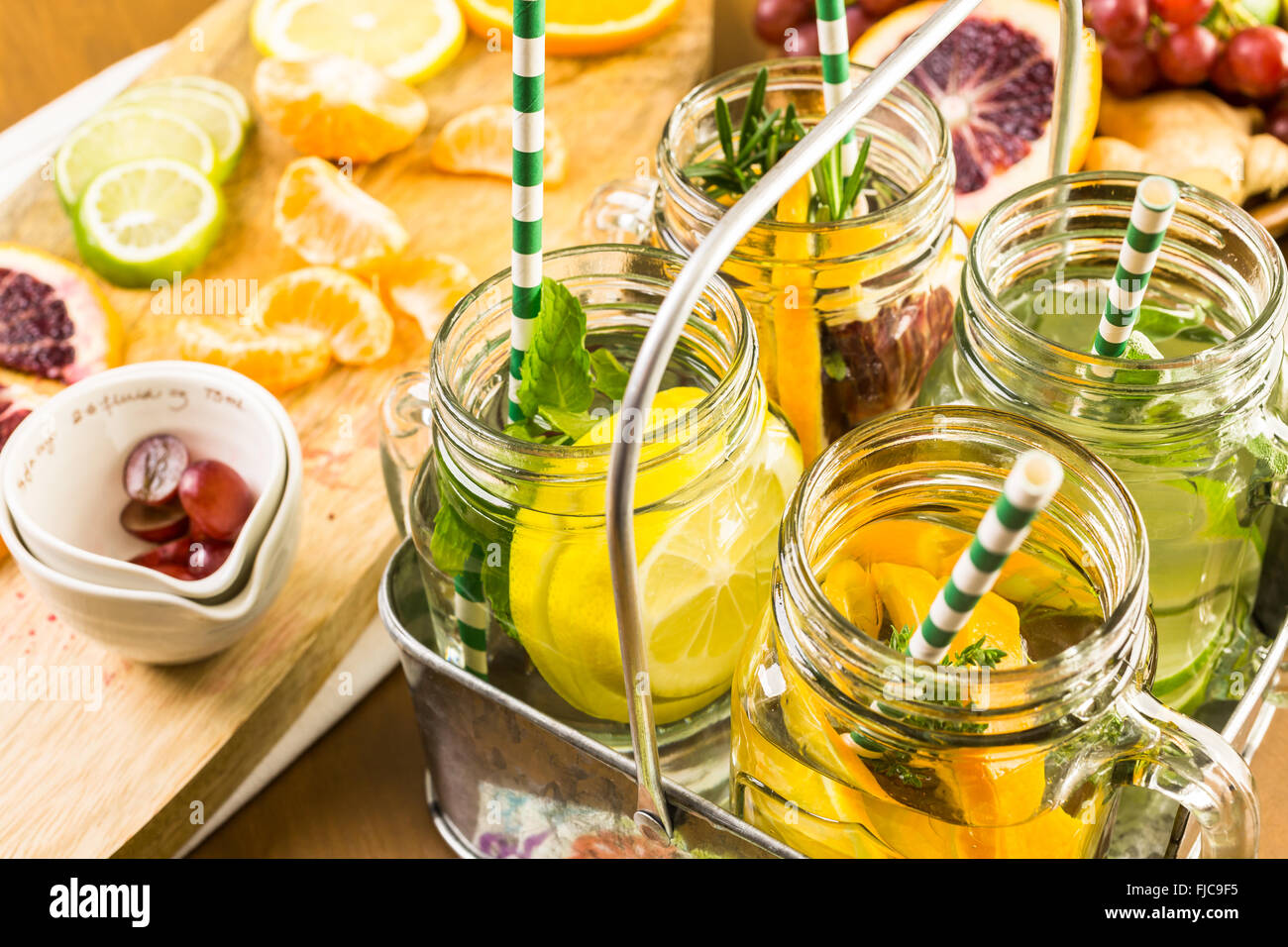 Detox citrus infused water as a refreshing summer drink Stock Photo - Alamy