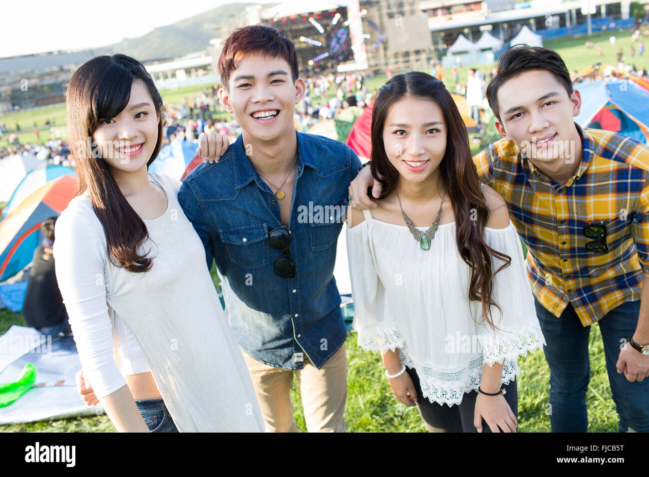 Happy young asian indian couple camping hi-res stock photography and ...