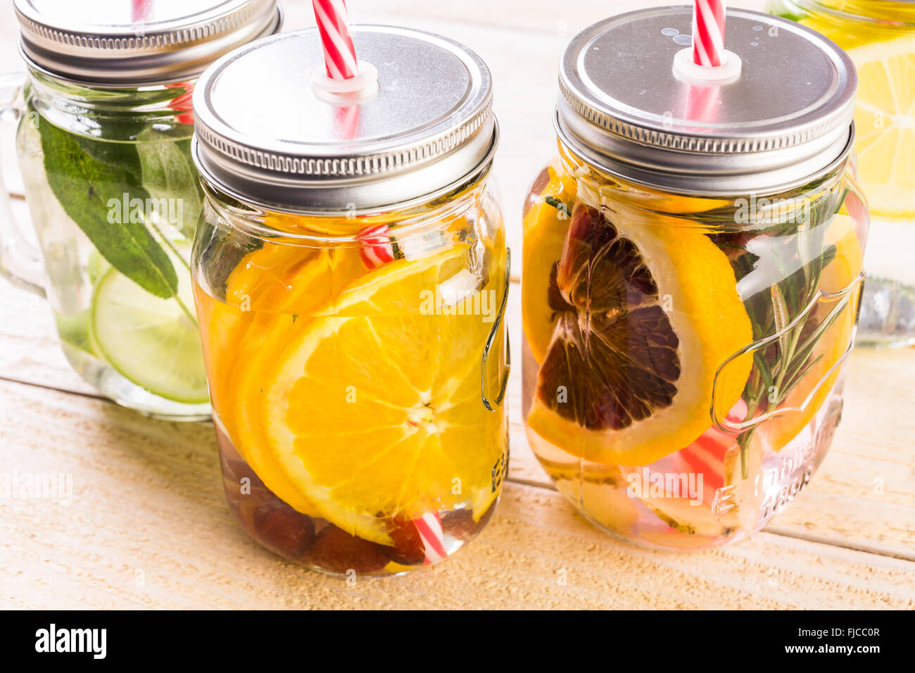 Detox citrus infused water as a refreshing summer drink Stock Photo - Alamy