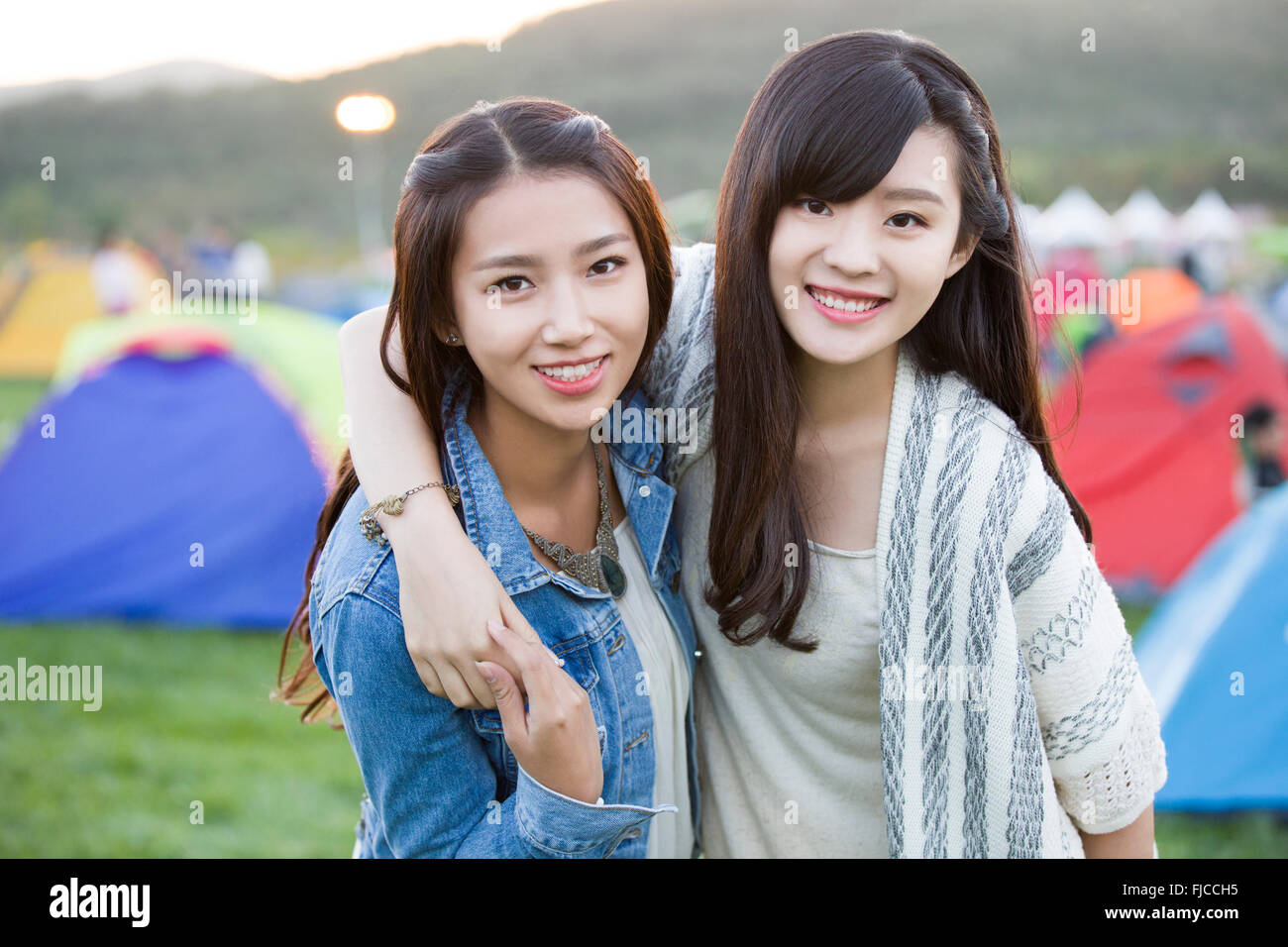 Happy young Chinese women Stock Photo - Alamy