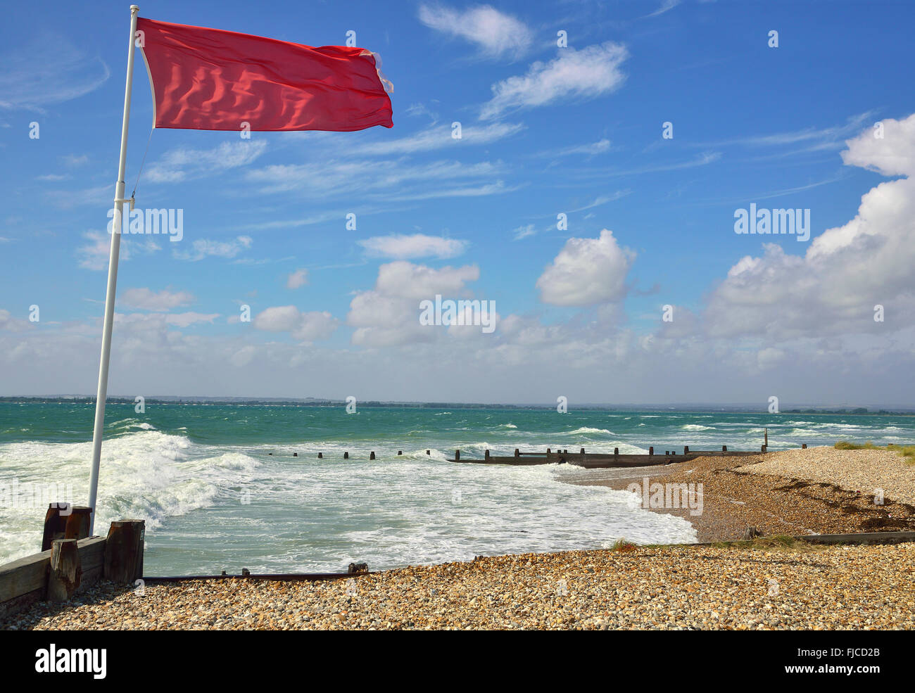 Bright red flag hi-res stock photography and images - Alamy