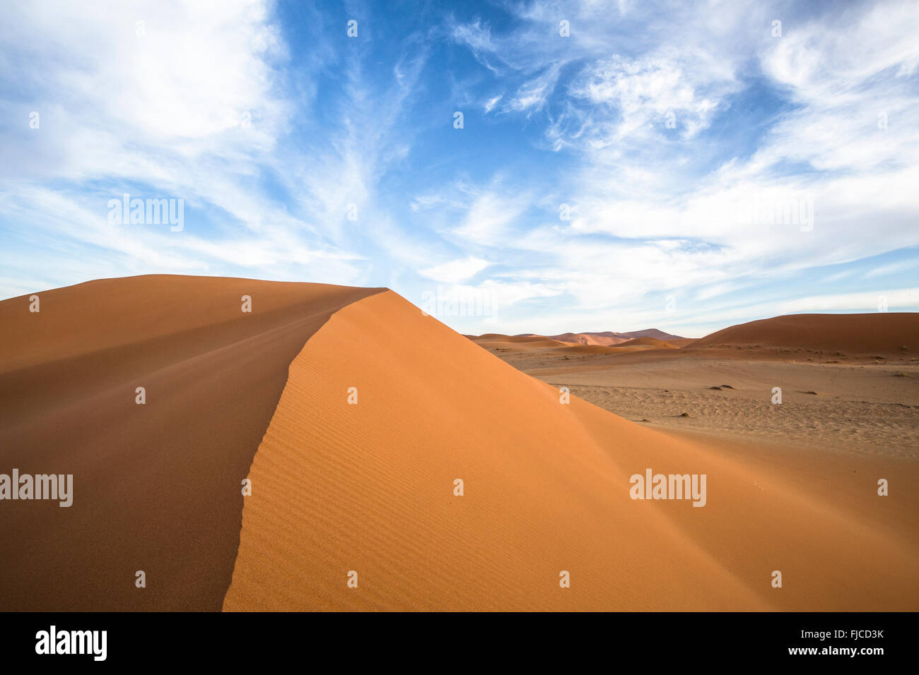 Red sand dunes hi-res stock photography and images - Alamy