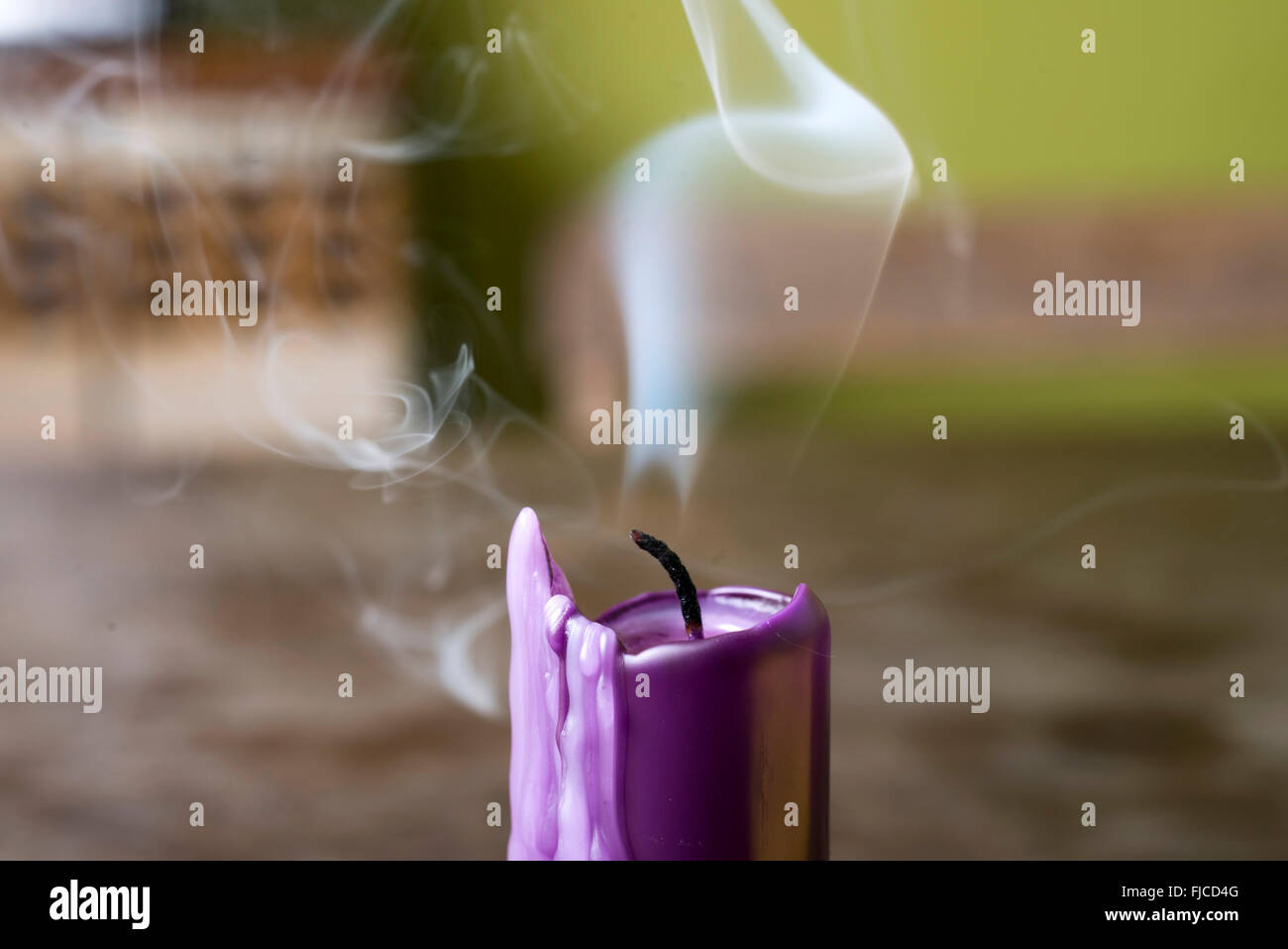 Extinguished candle and smoke Stock Photo - Alamy