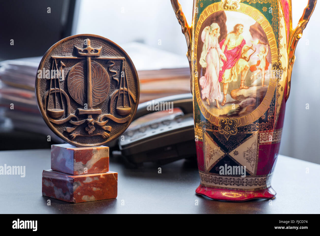 symbol of order with lawyers on table with old lamp Stock Photo - Alamy