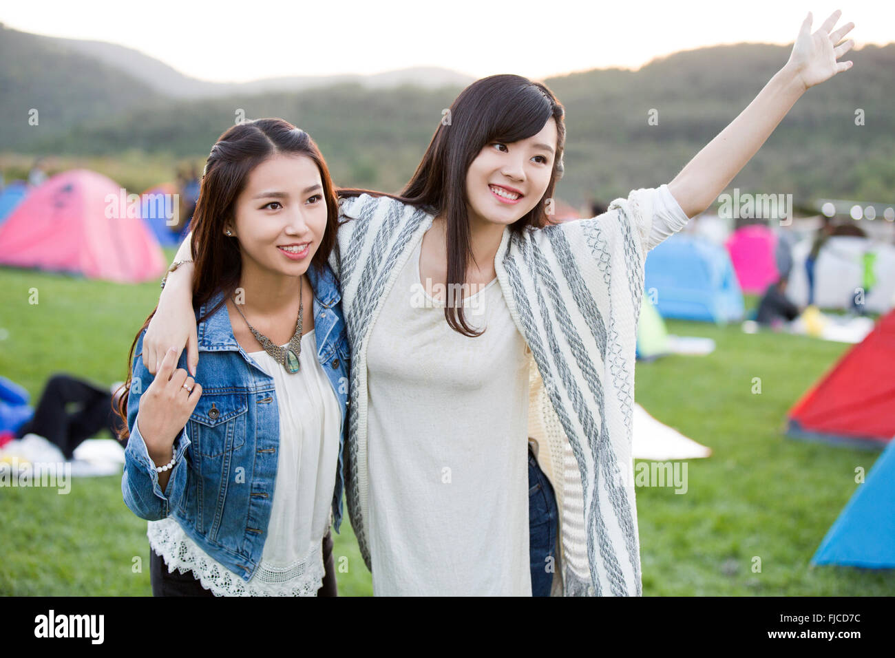 Happy young Chinese women Stock Photo - Alamy