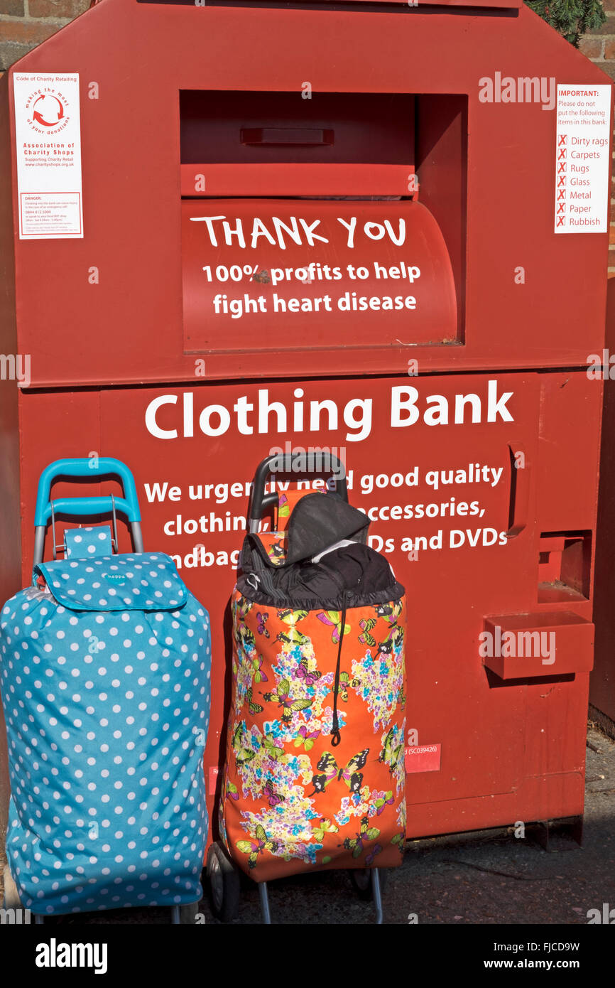 British Hearth Foundation clothing bank with wheeled bags full of ...