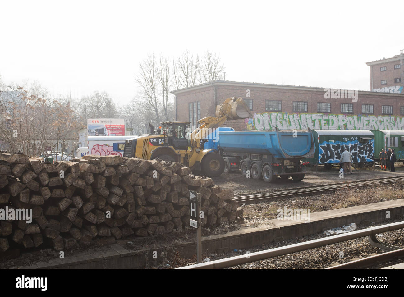 BERLIN. 01 JANUARY: A backhoe performing work on the railroad tracks in ...