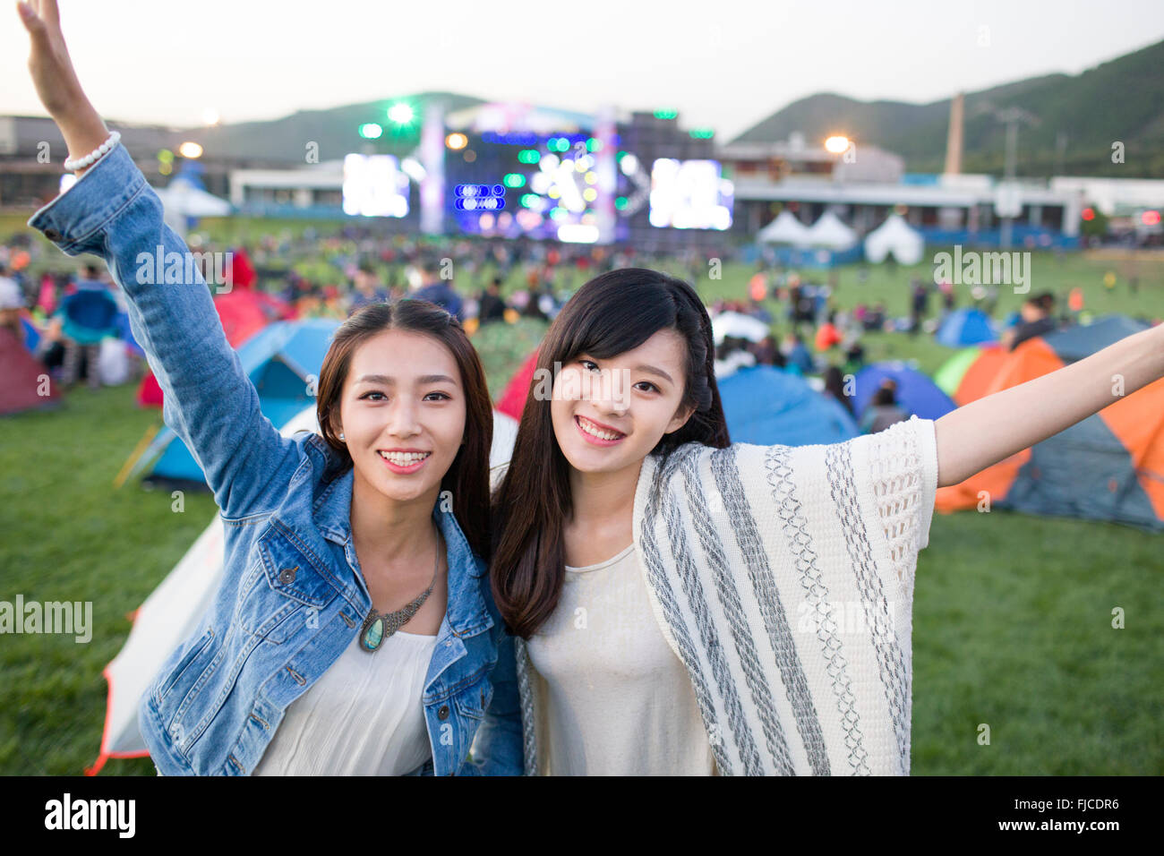 Happy young Chinese women Stock Photo - Alamy